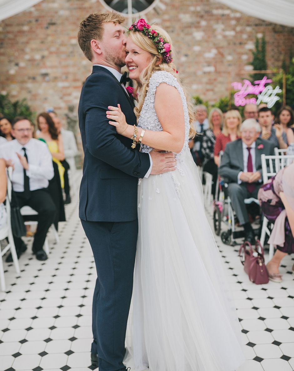 Conservatory Wedding Venue with Neon Sign & Bright Pink Flowers