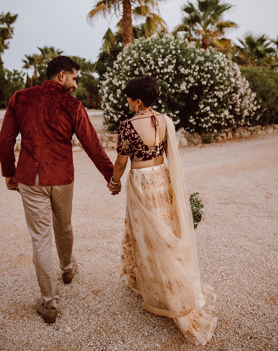 First Dates Wedding in Mallorca with Burgundy & Gold Indian Dress